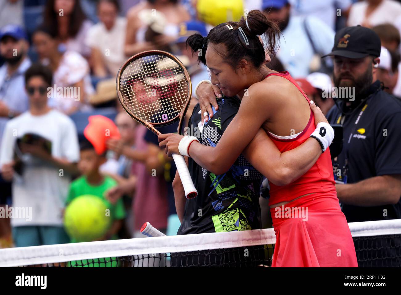 New York, United States. 04th Sep, 2023. Qinwen Zheng of China embraces ...