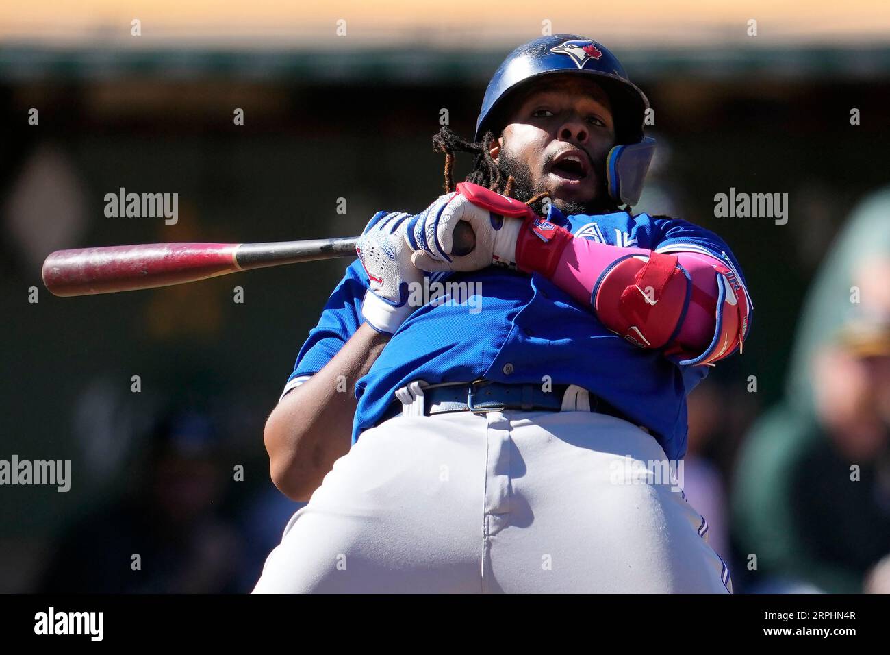 Toronto Blue Jays' Vladimir Guerrero Jr. leans back to avoid a pitch by ...