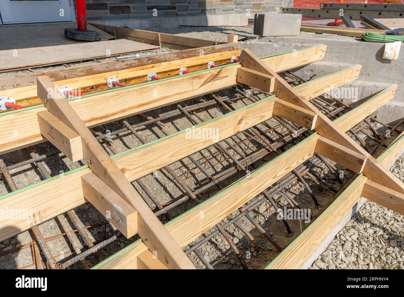 Wooden formwork with metal reinforcement prepared for pouring concrete ...