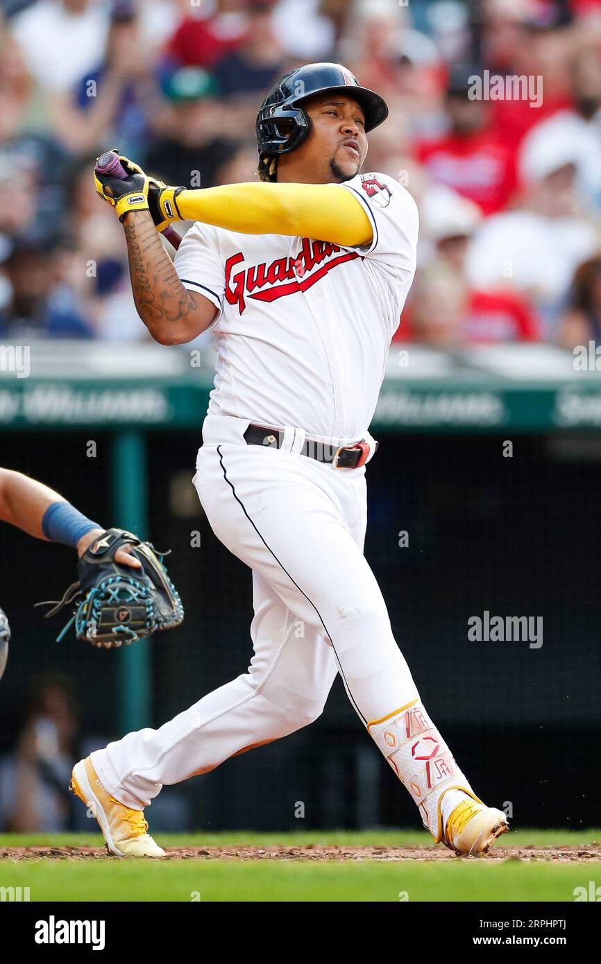 Cleveland Guardians third baseman Jose Ramirez (11) hits a line out in ...
