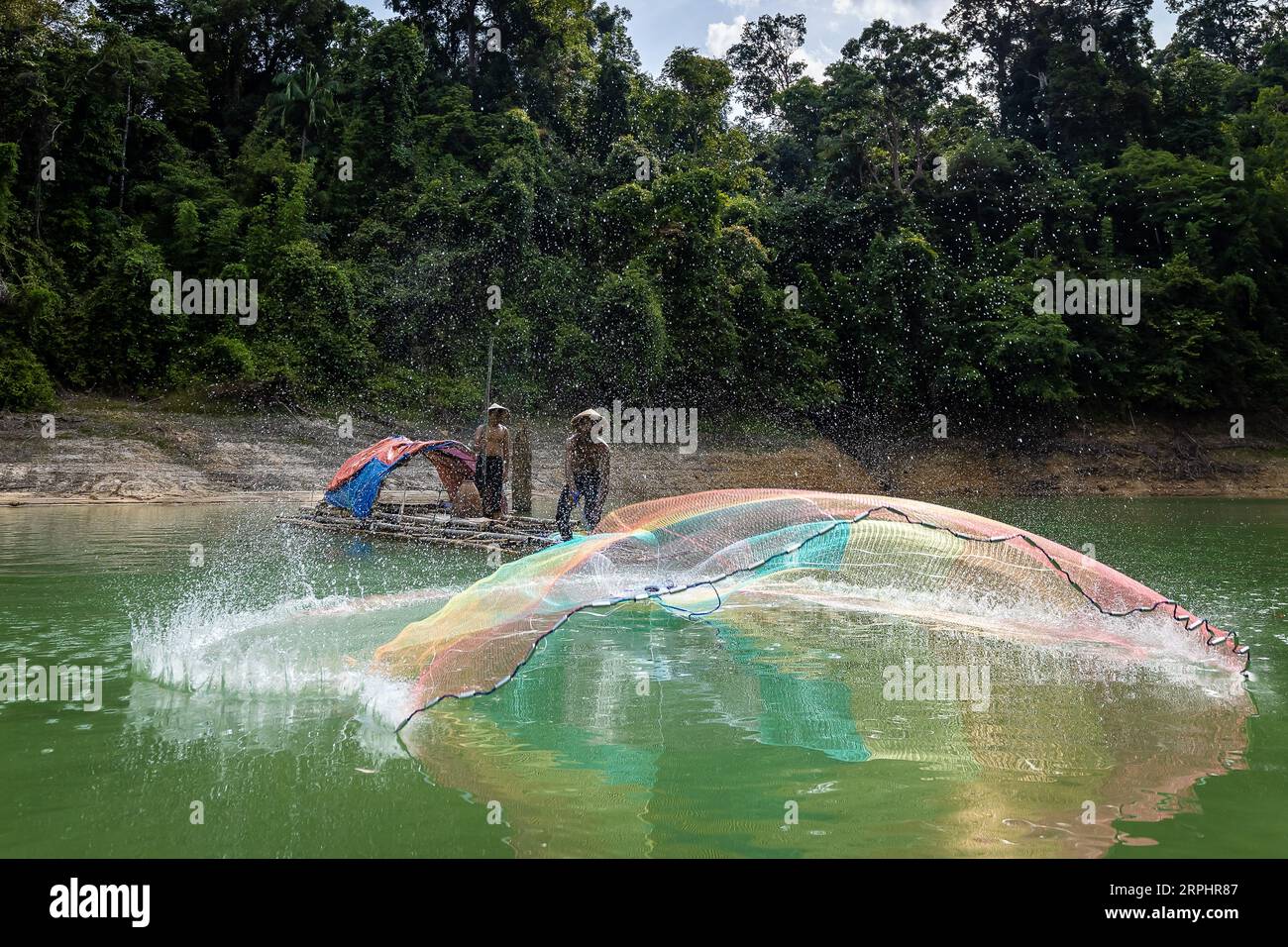 Fishing at Pedu’s lake located at Kedah state of Malaysia Stock Photo ...