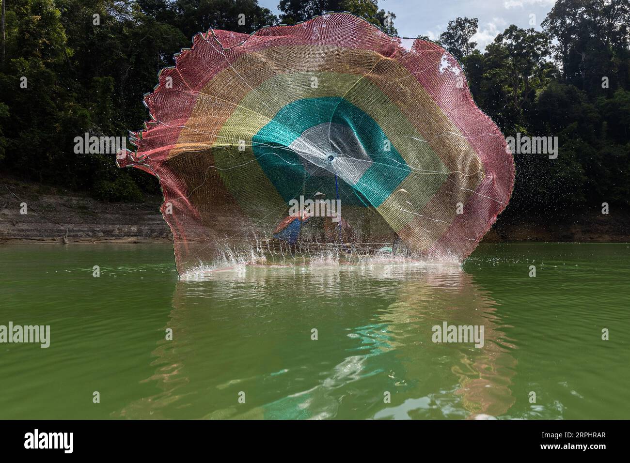 Fishing at Pedu’s lake located at Kedah state of Malaysia Stock Photo ...