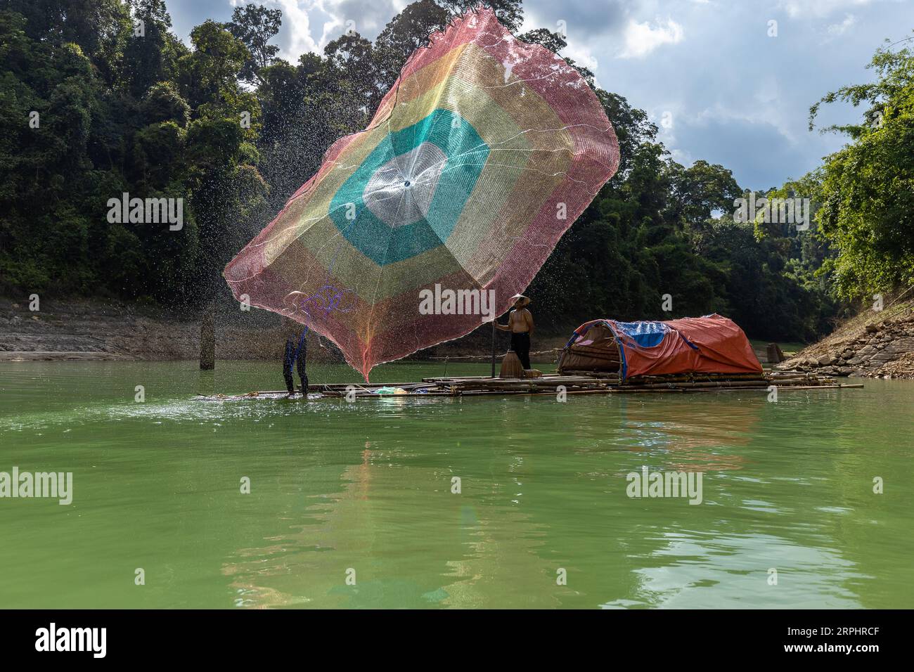 Fishing at Pedu’s lake located at Kedah state of Malaysia Stock Photo ...