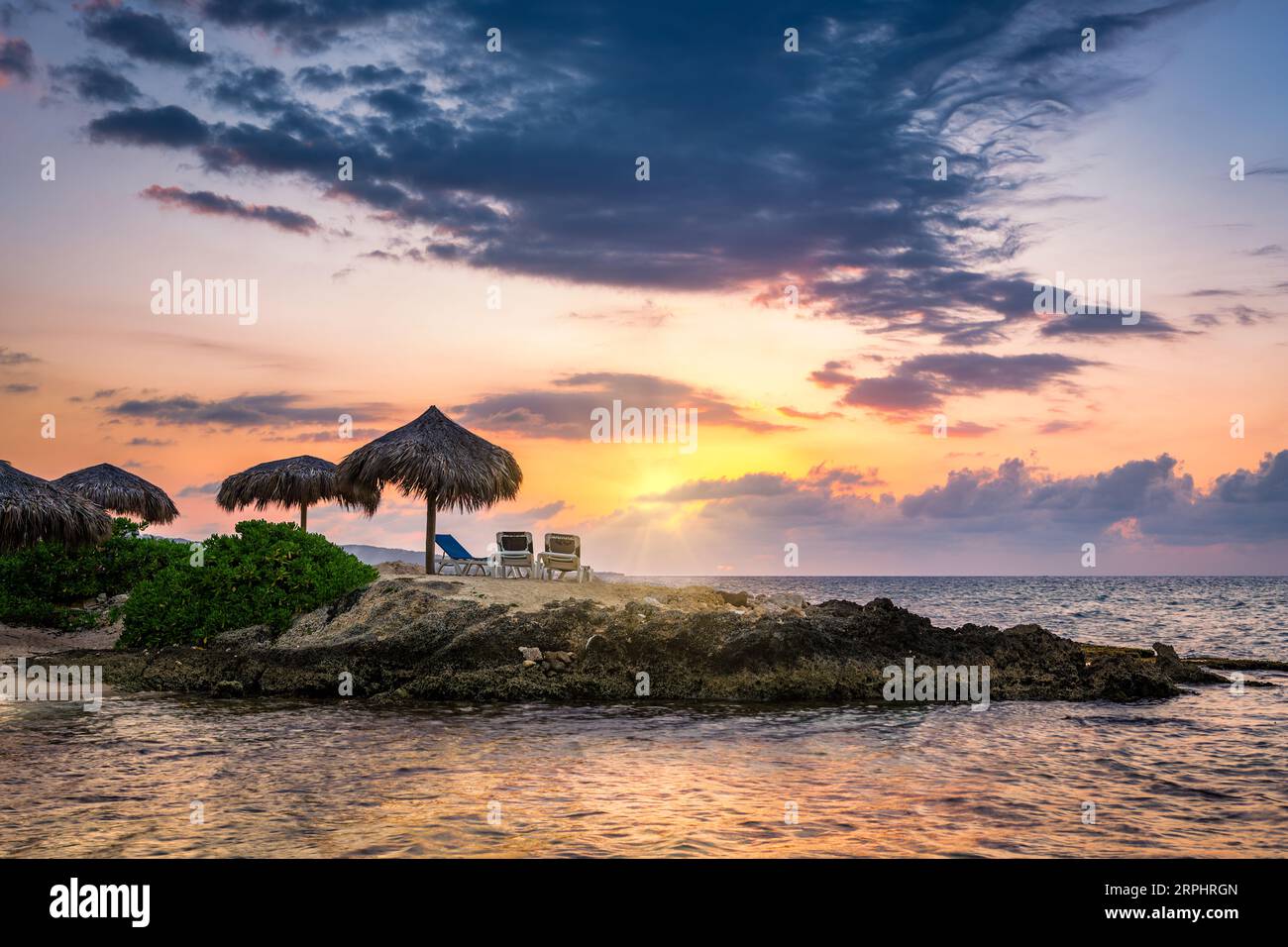 Sunset over rocky coastline hi-res stock photography and images - Alamy