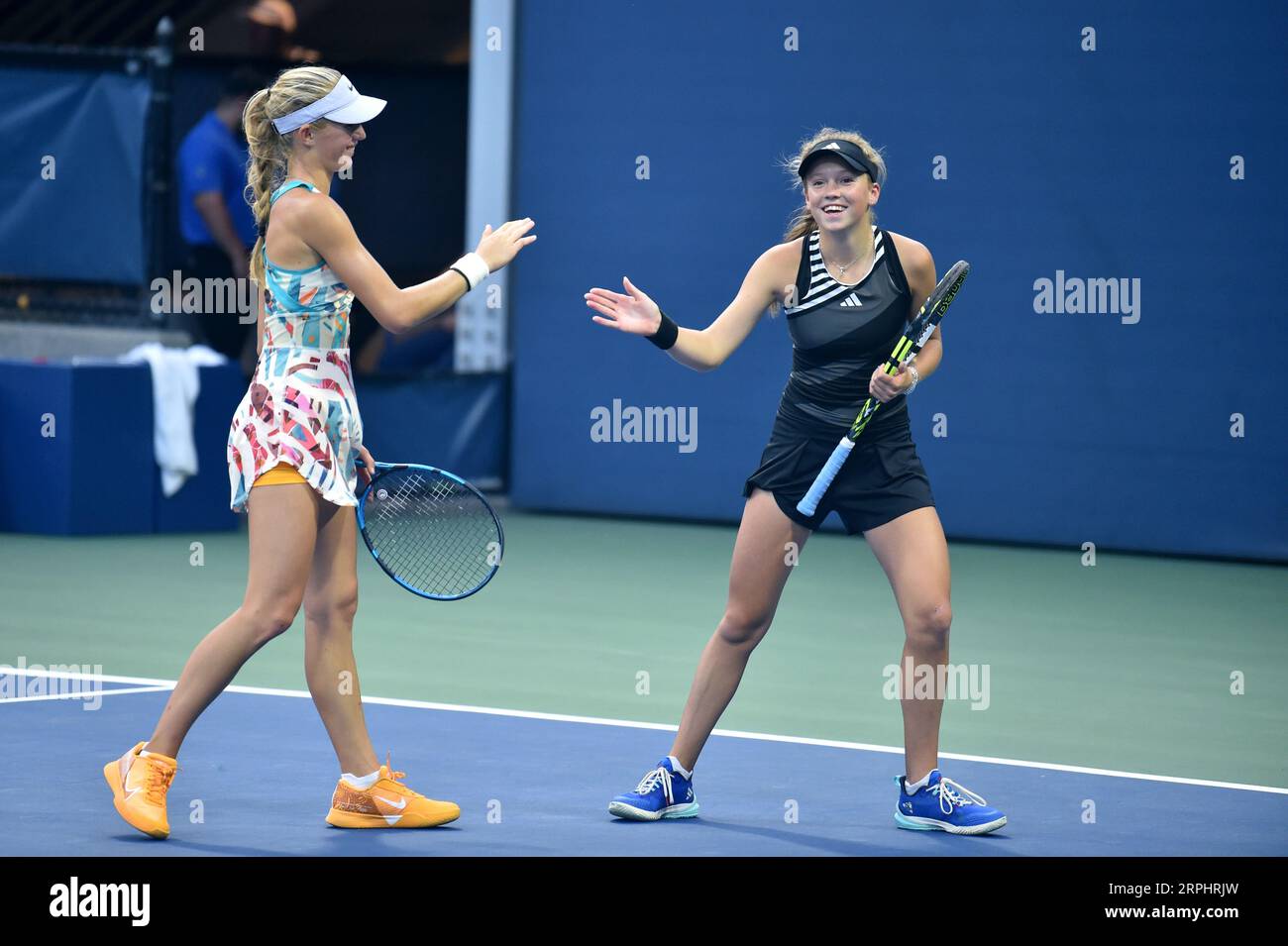 Elena Kovackova and Laura Samsonova during a junior girls' doubles ...