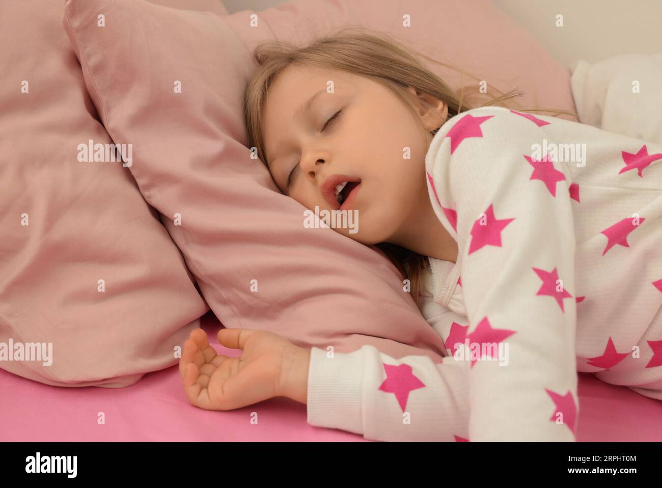 Little girl snoring while sleeping in bed Stock Photo - Alamy Little girl snoring while sleeping in bed Stock Photo - Alamy