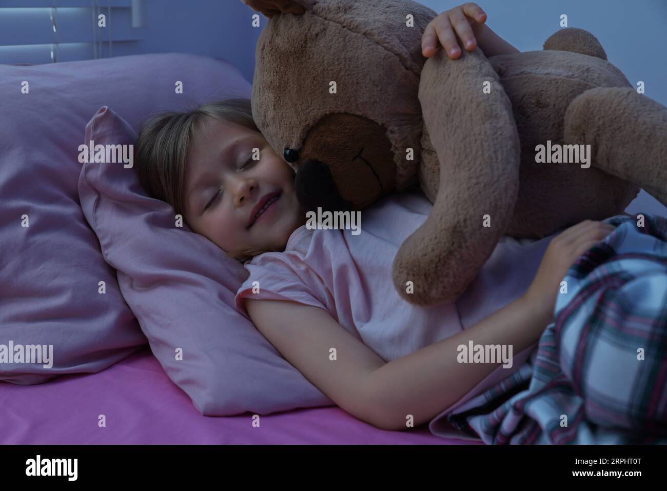 Little girl snoring while sleeping in bed at home Stock Photo - Alamy