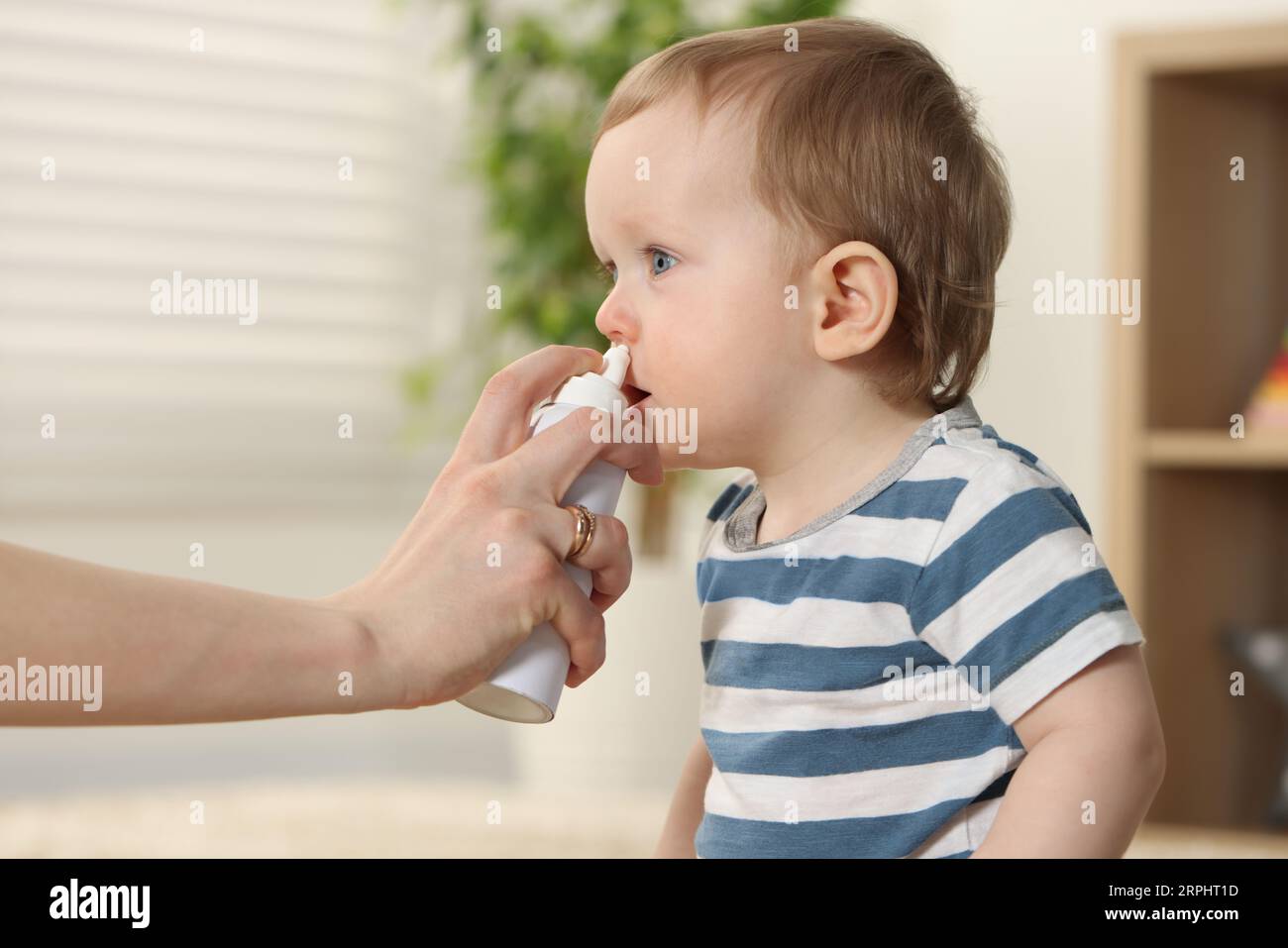 Mother care daughter spray hi-res stock photography and images - Alamy
