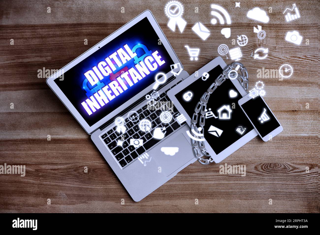 Digital inheritance concept. Chained laptop, tablet and phone on wooden ...