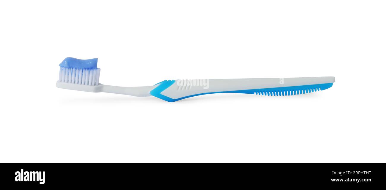 Plastic toothbrush with paste on white background Stock Photo - Alamy