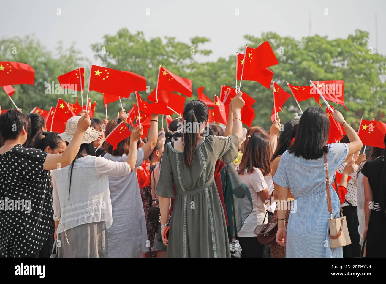 People waving flags hi-res stock photography and images - Alamy