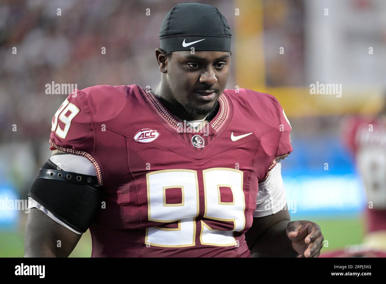Florida State defensive lineman Malcolm Ray (99) walks to the end zone ...