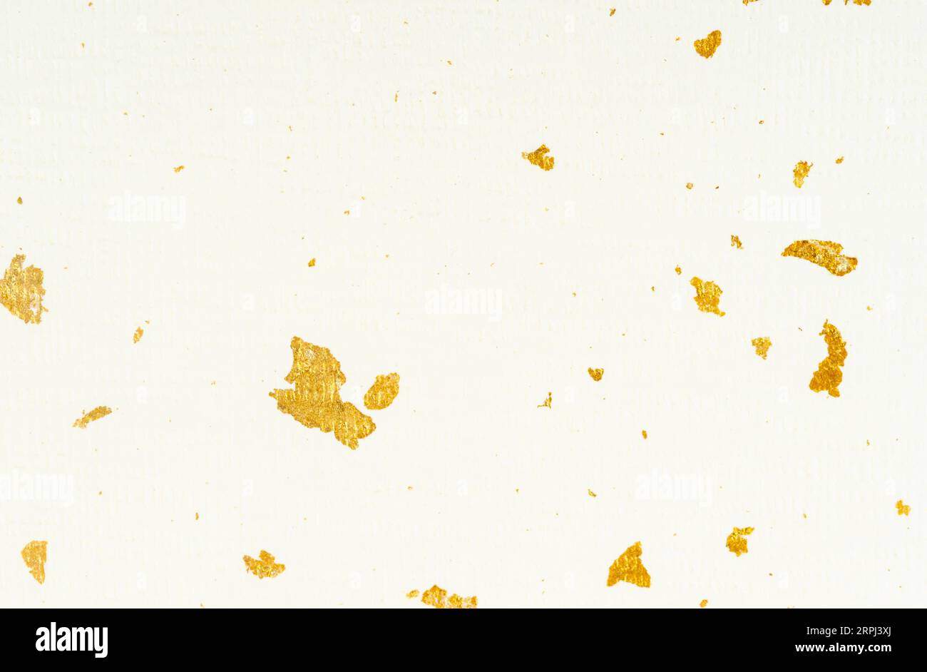 Paper with gold sheet texture as background Stock Photo - Alamy