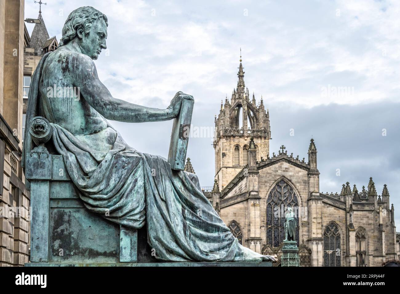 Bronze sculpture of David Hume and St Giles' Chathedral on the Royal ...