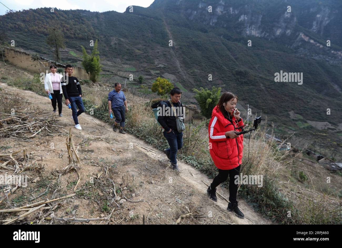 Woman going down a ladder hi-res stock photography and images - Alamy