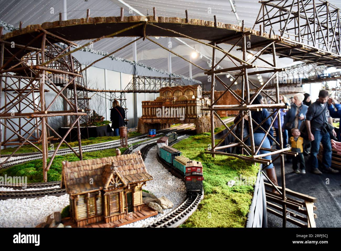 191127 -- NEW YORK, Nov. 27, 2019 -- A model train runs out of the ...