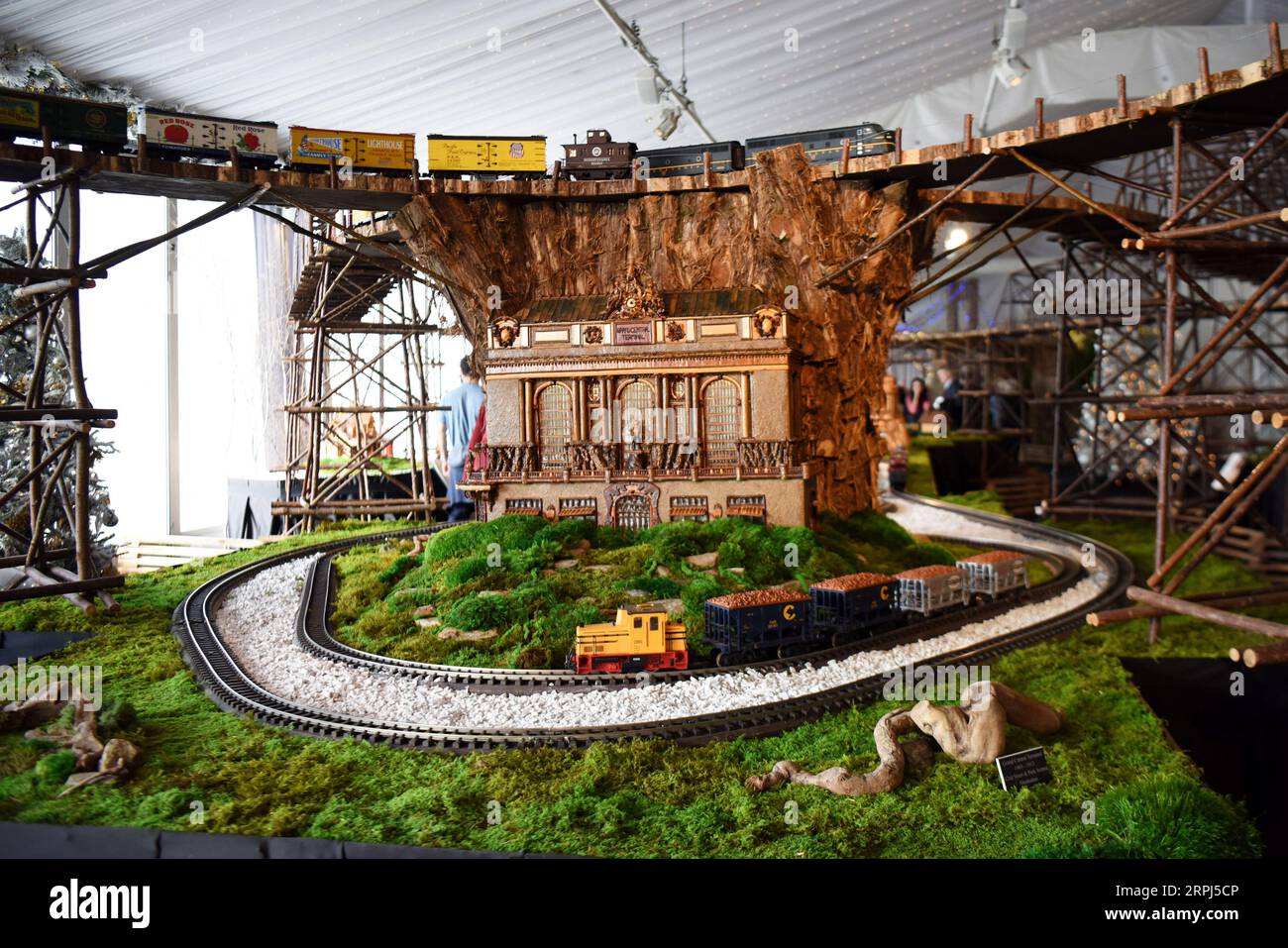 191127 -- NEW YORK, Nov. 27, 2019 -- Model trains run past the ...