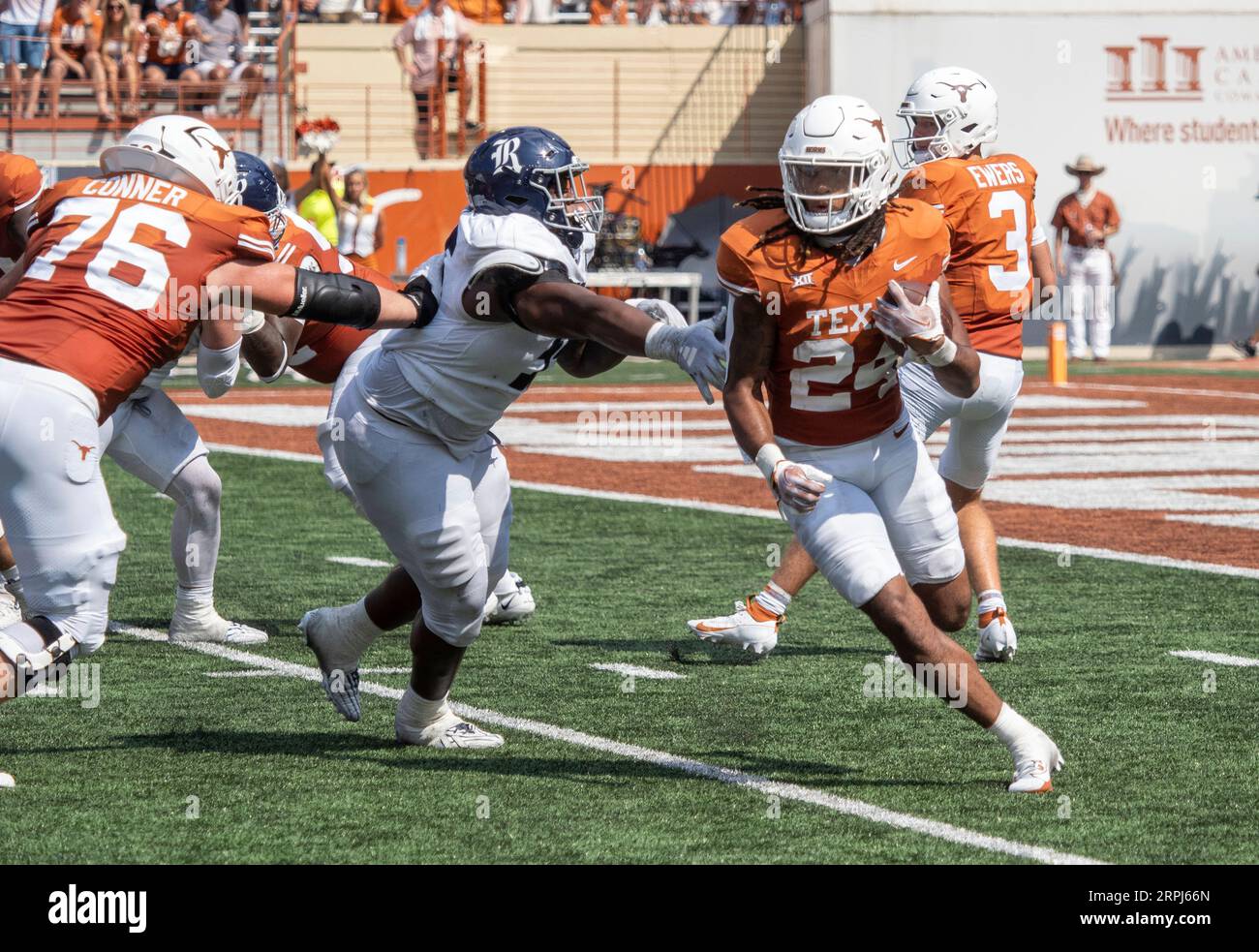 Texas running back Jonathon Brooks (24) runs against Rice defensive ...