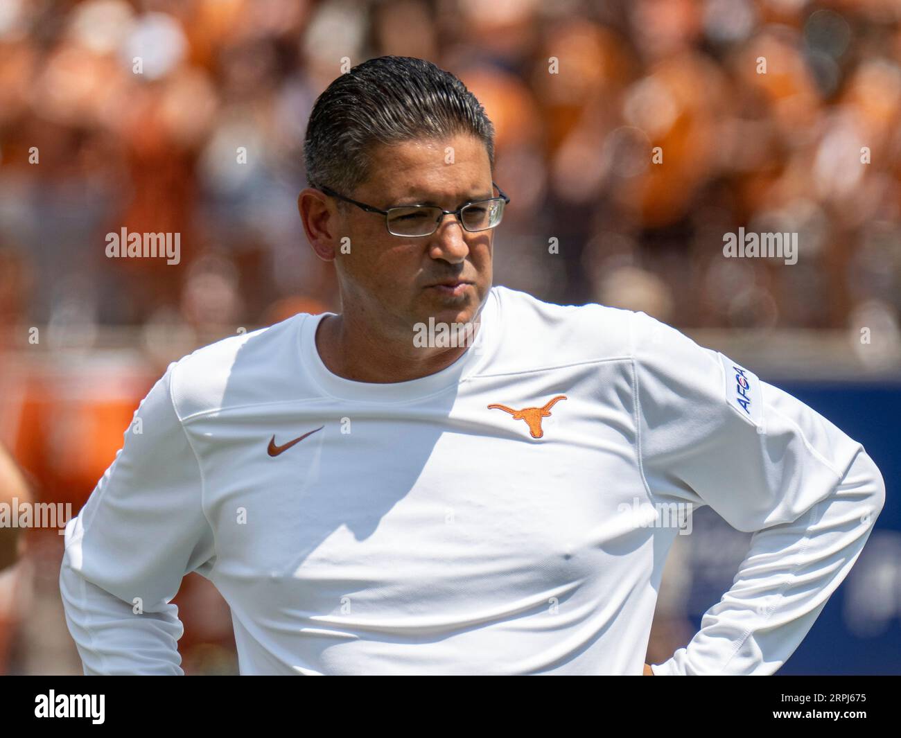 Texas assistant head coach Jeff Banks looks on during the team's warm ...