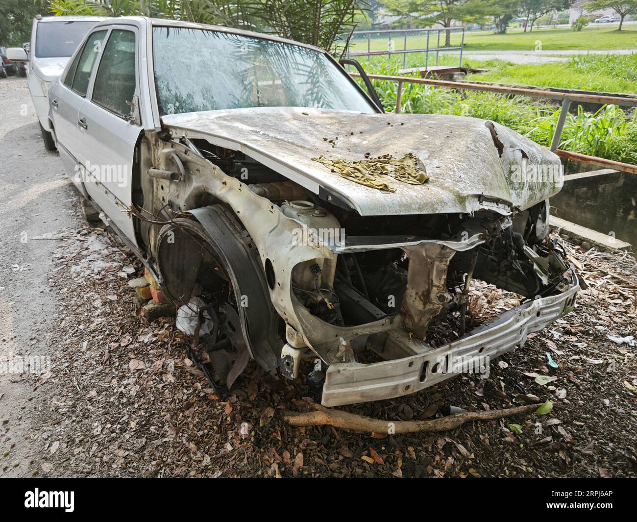 unrecognizable and wrecked cars beyond repair left at the isolated junk ...