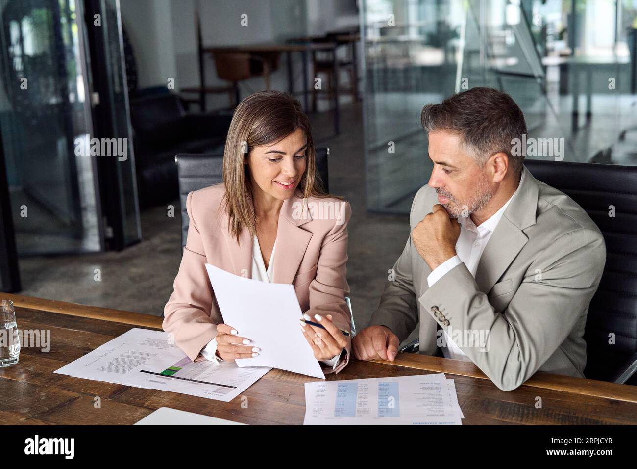 Lawyer showing document client hi-res stock photography and images - Alamy