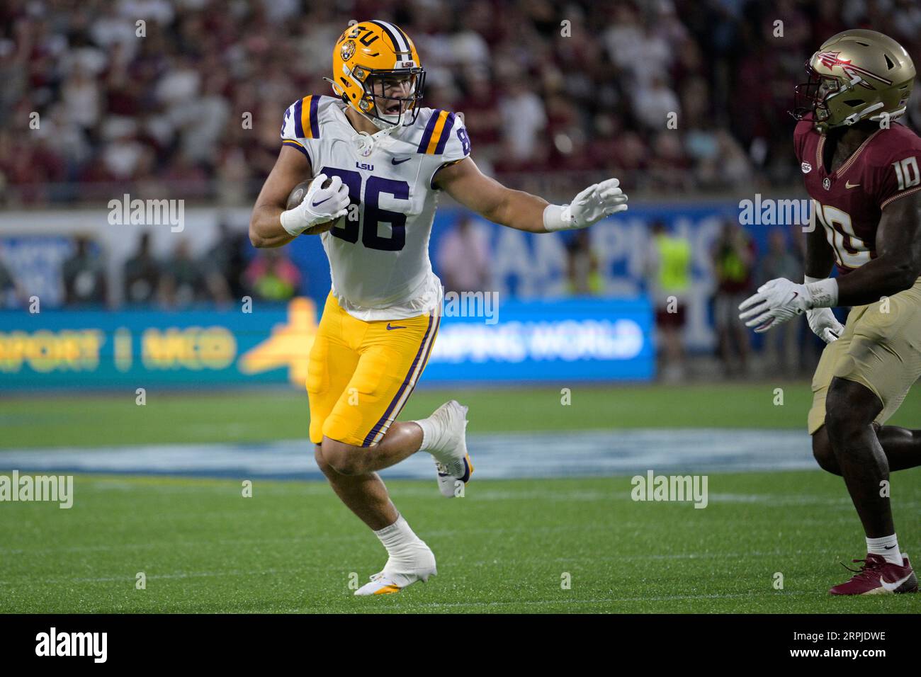 LSU tight end Mason Taylor (86) runs after catching a pass in front of ...