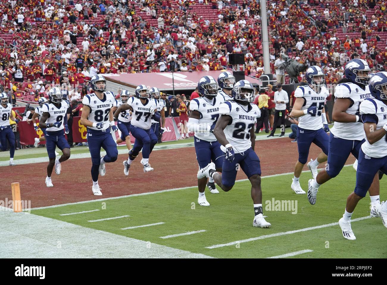 Nevada Wolf Pack running out on the field against the USC Trojans ...