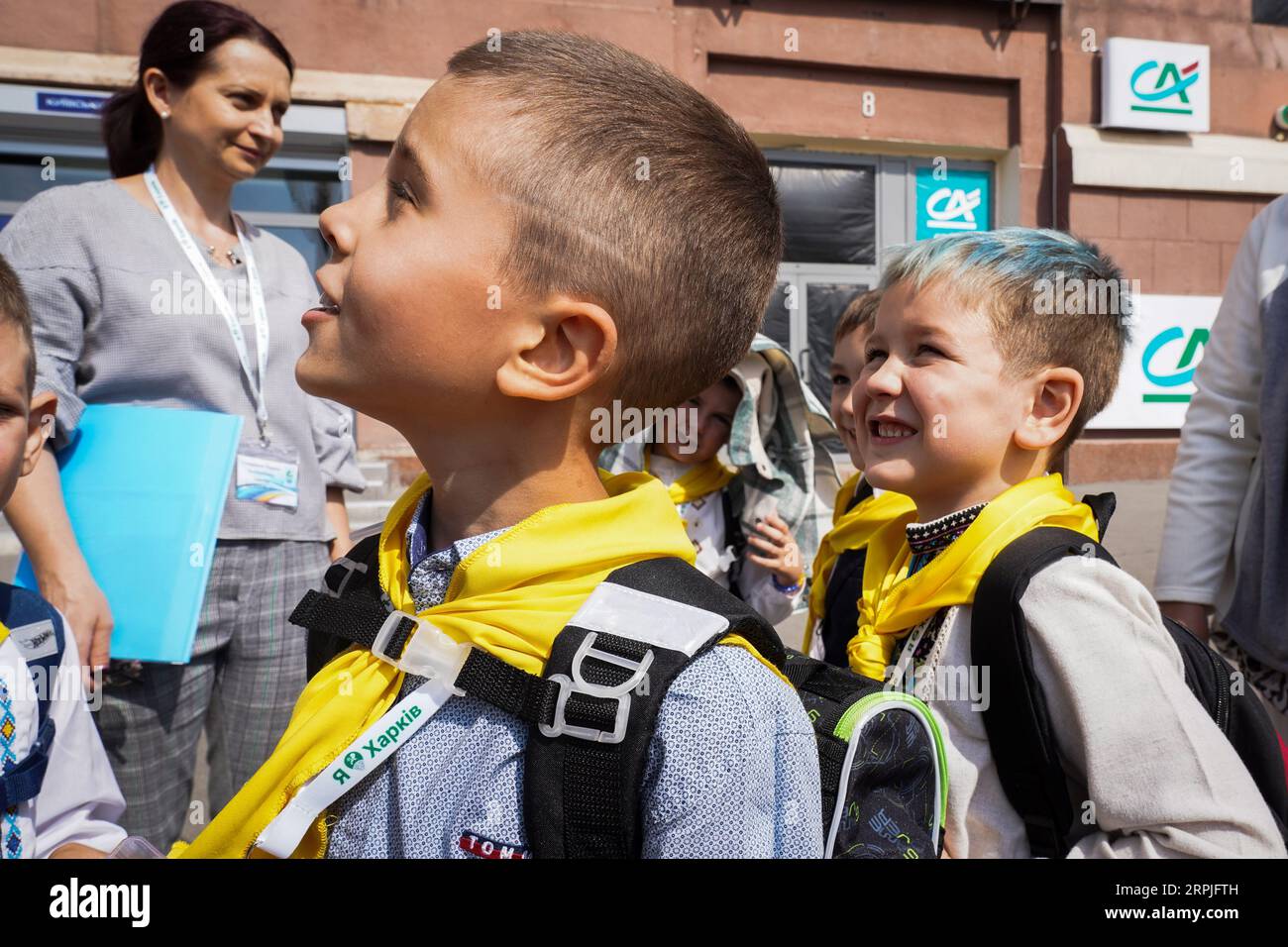 Kharkiv, Ukraine. 04th Sep, 2023. Two schoolboys are seen with their ...