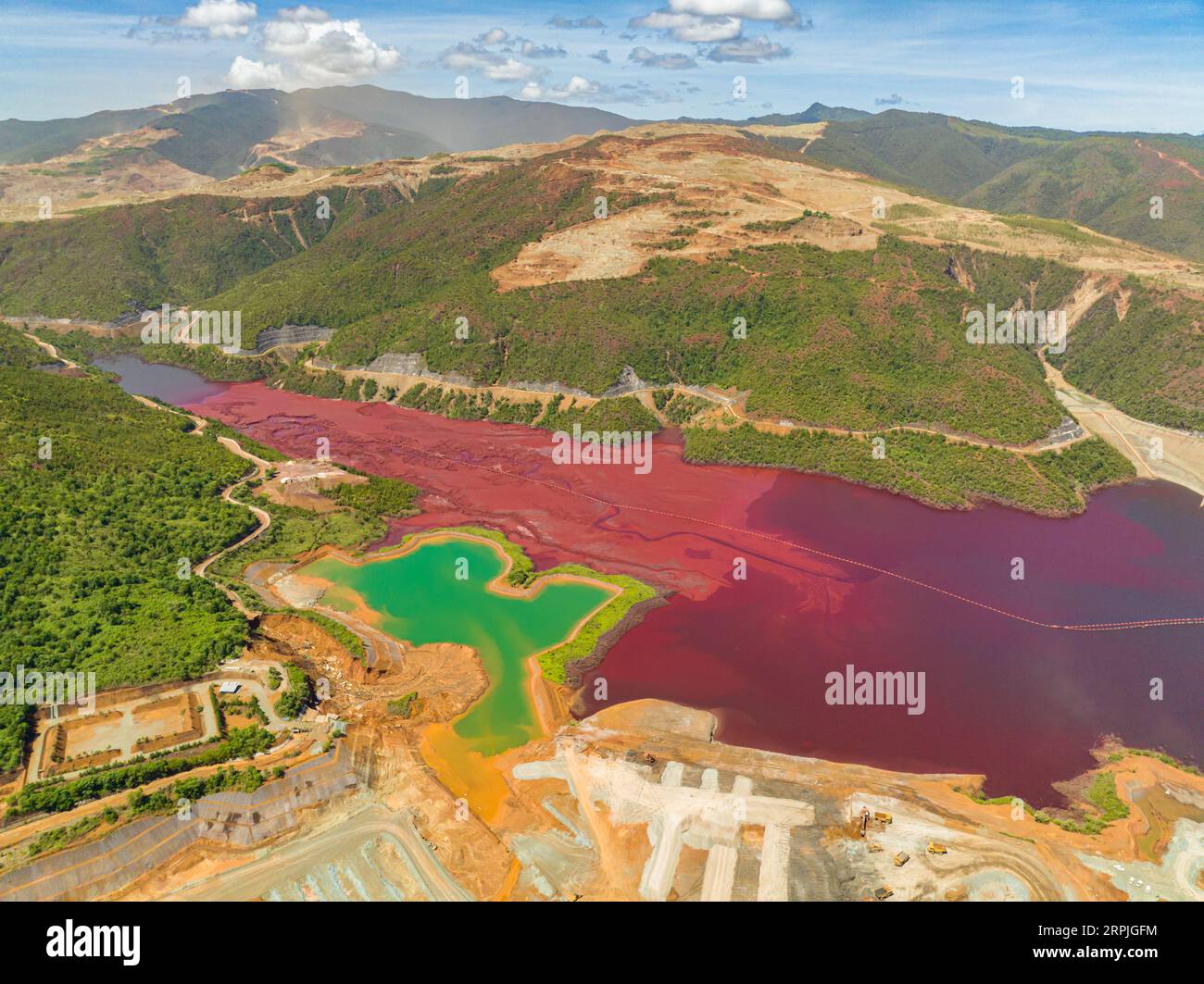 A lake with polluted water in a nickel mine. Mining in an open pit ...