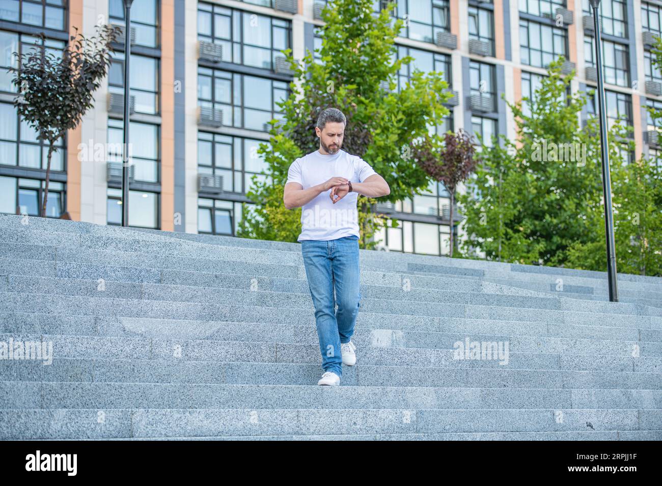 full length of punctual man check time outdoor. punctual man check time ... full length of punctual man check time outdoor. punctual man check time ...