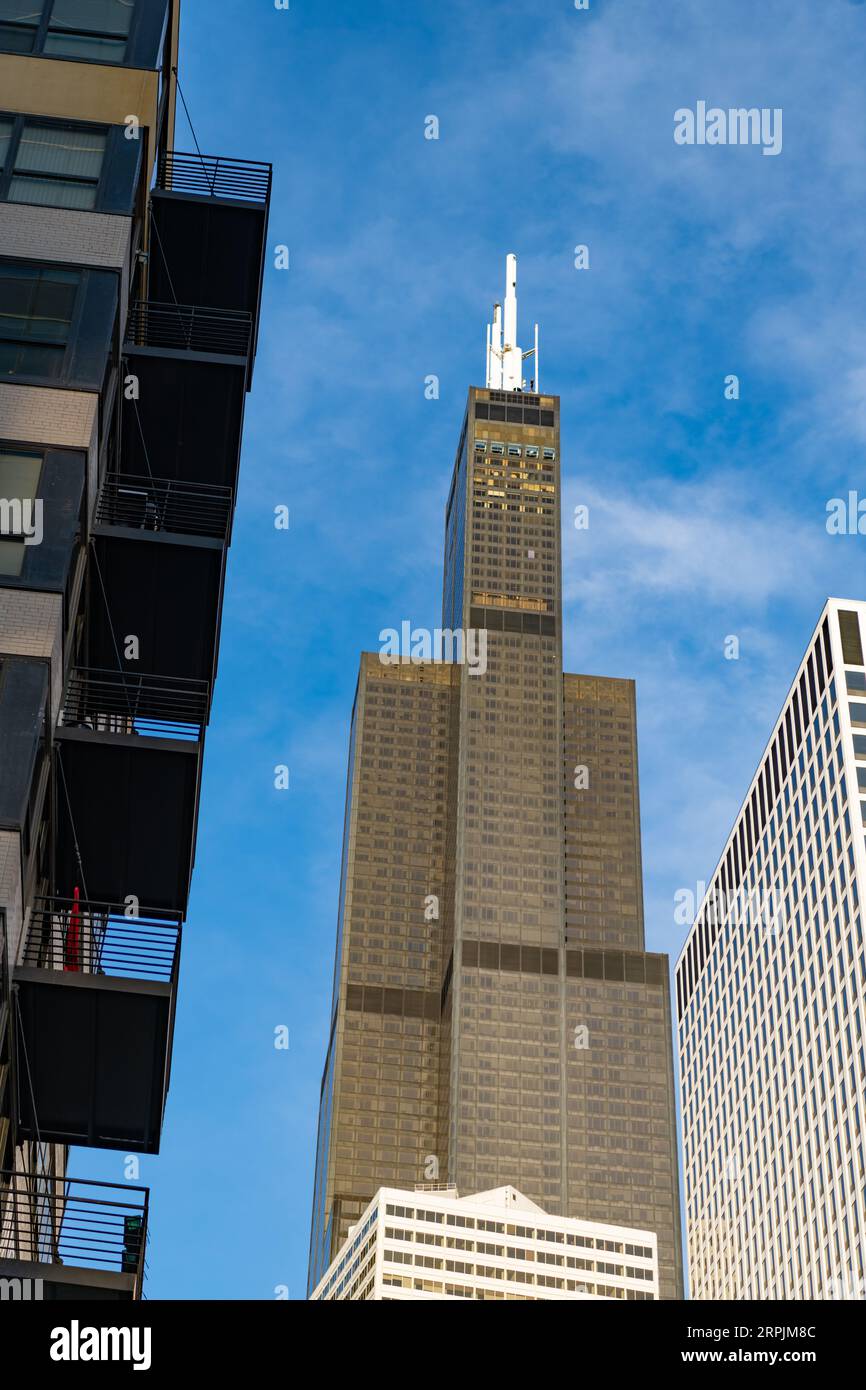 skyscraper with glassy facade. modern city perspective. skyscraper in ...