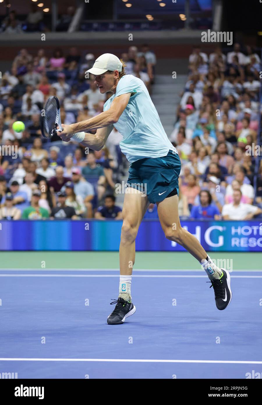 Jannik Sinner hits a backhand during a men's singles match at the 2023 ...