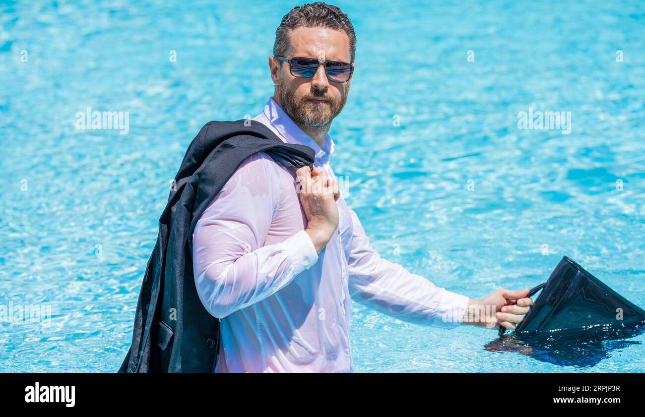 Businessman in swimming pool. business man on summer vacation. Business ...