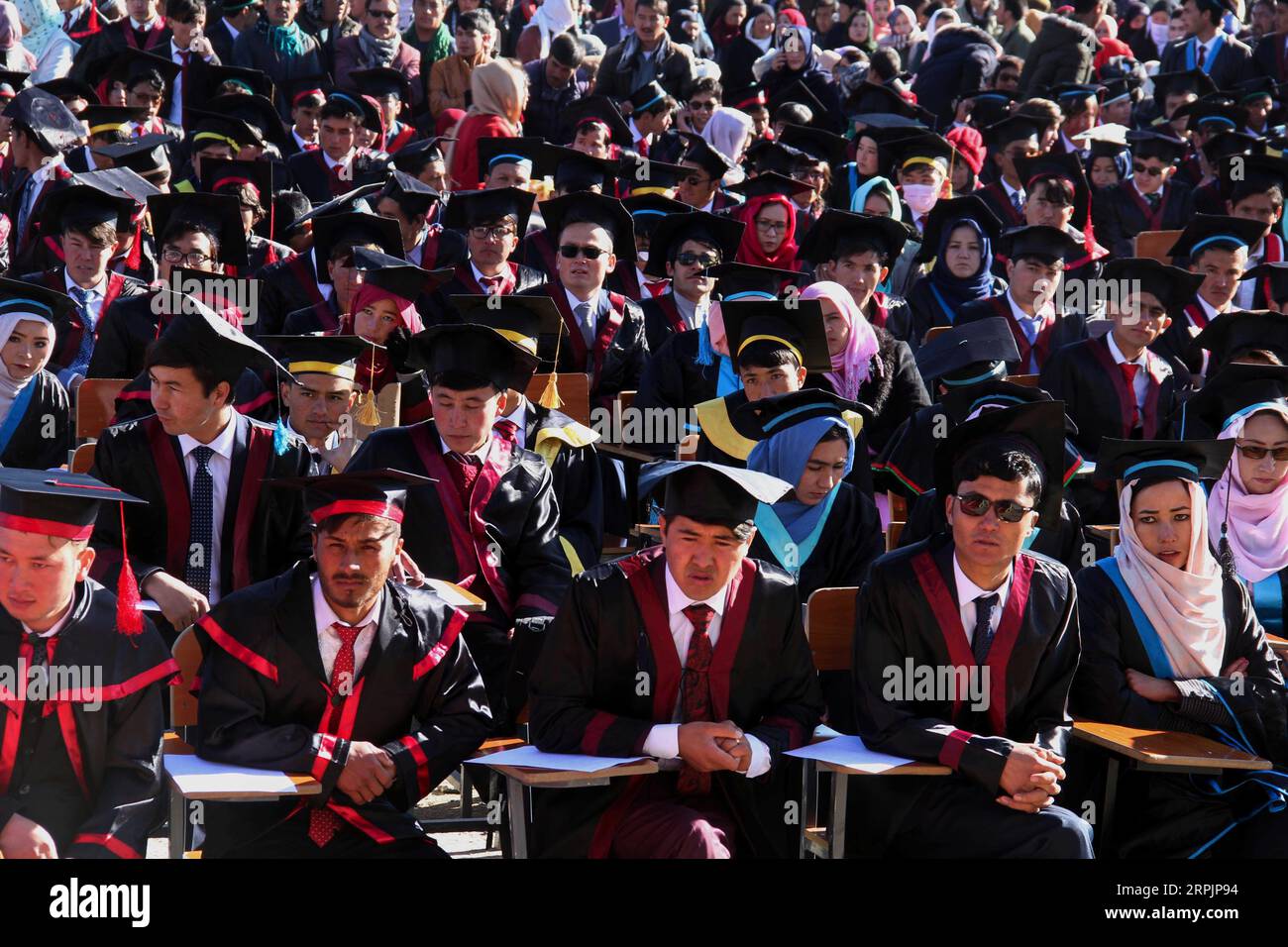 191217 -- BAMIYAN, Dec. 17, 2019 -- Students take part in their graduation ceremony at Bamyan ...