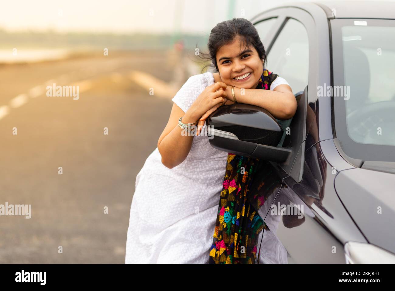 Indian girl driving her car hi-res stock photography and images - Alamy