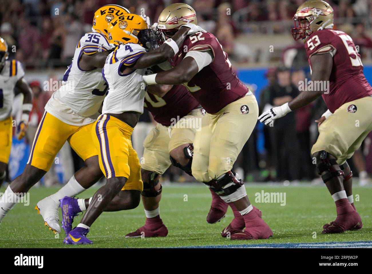 Florida State offensive lineman Robert Scott Jr. (52) blocks against ...