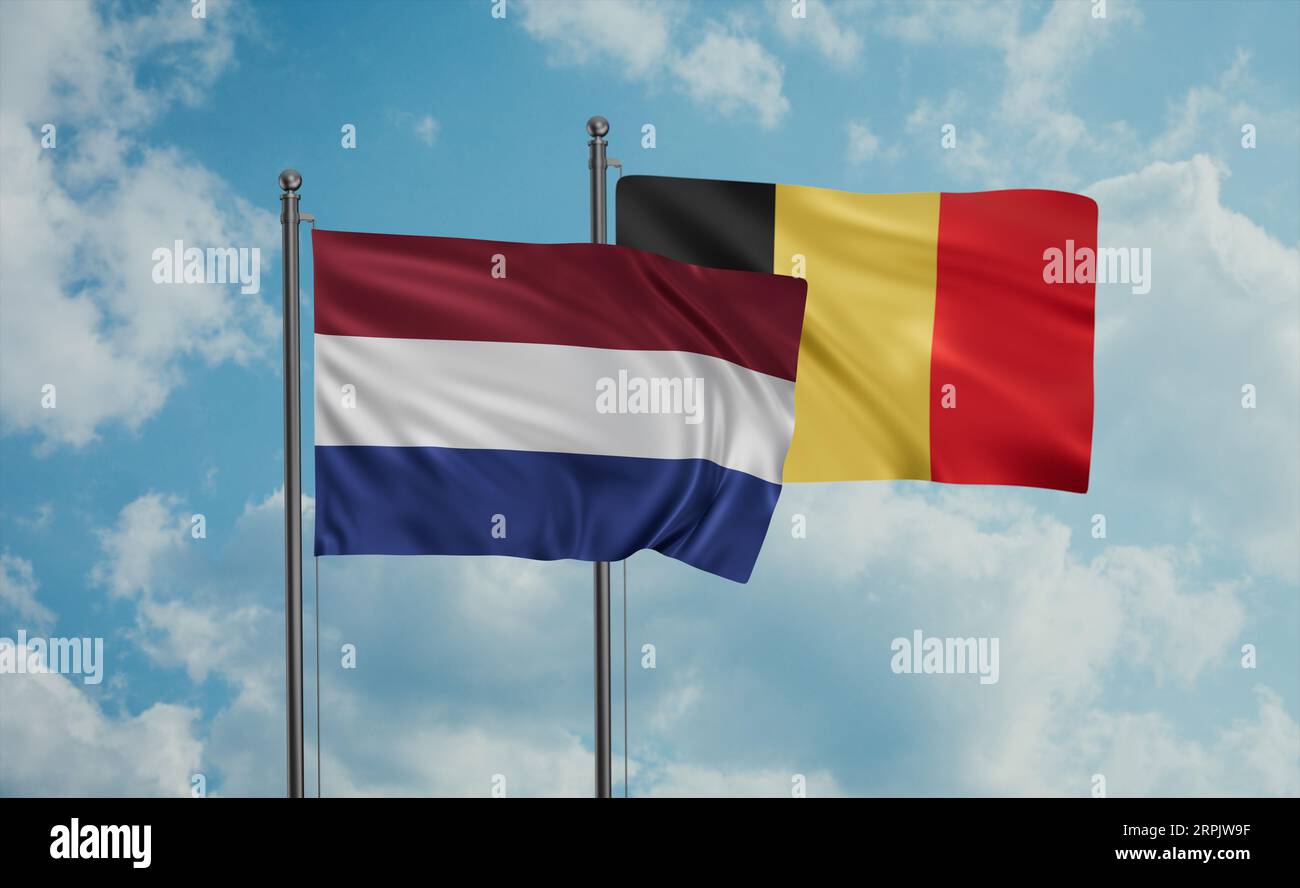 Belgium flag and Netherlands flag waving together on blue sky, two ...