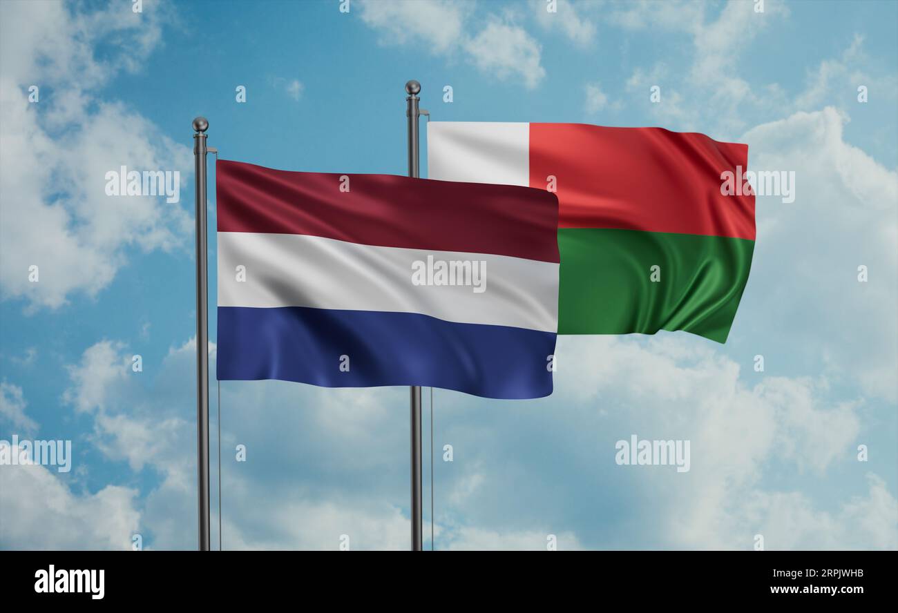 Madagascar flag and Netherlands flag waving together on blue sky, two ...