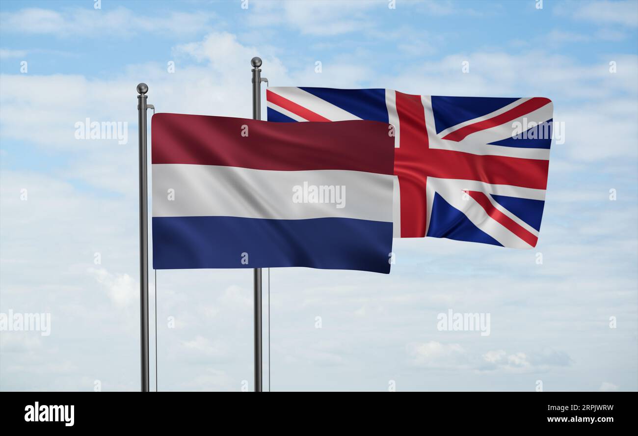 United Kingdom and Netherlands flag waving together in the wind on blue ...
