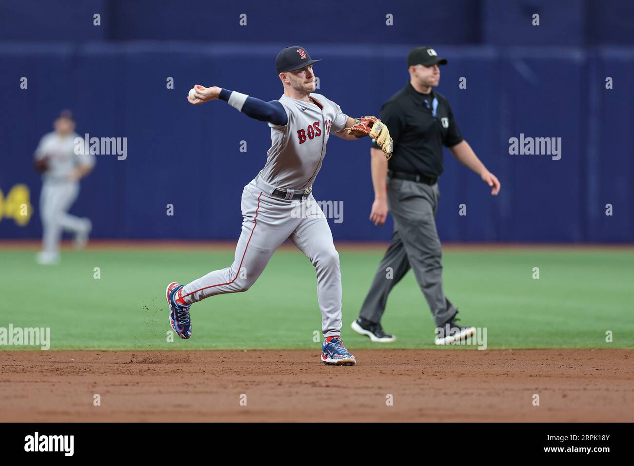 St. Petersburg, FL USA; Boston Red Sox shortstop Trevor Story (10) throws out Tampa Bay Rays ...