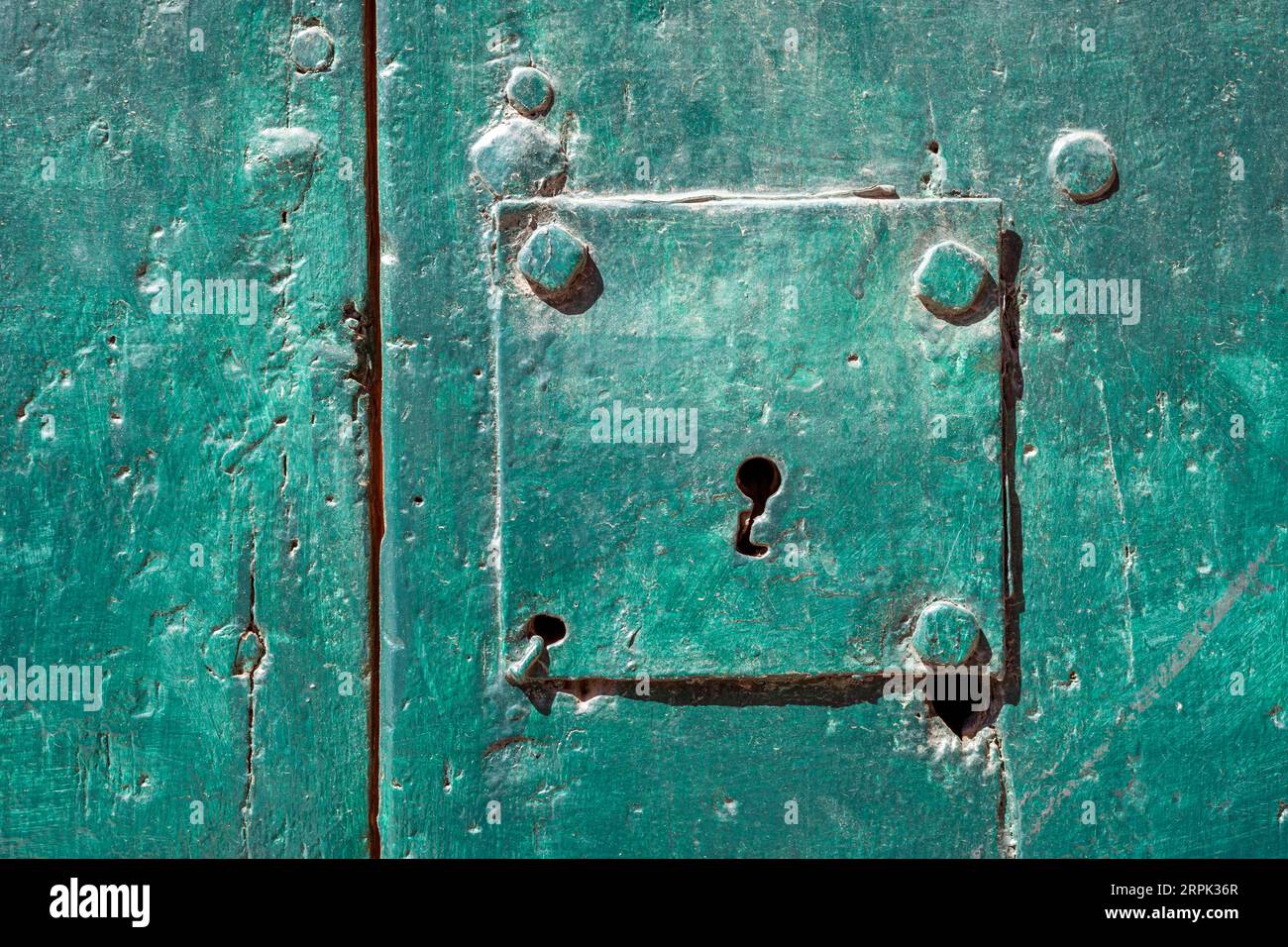 detailed background of green metallic door with focus on keyhole Stock ...