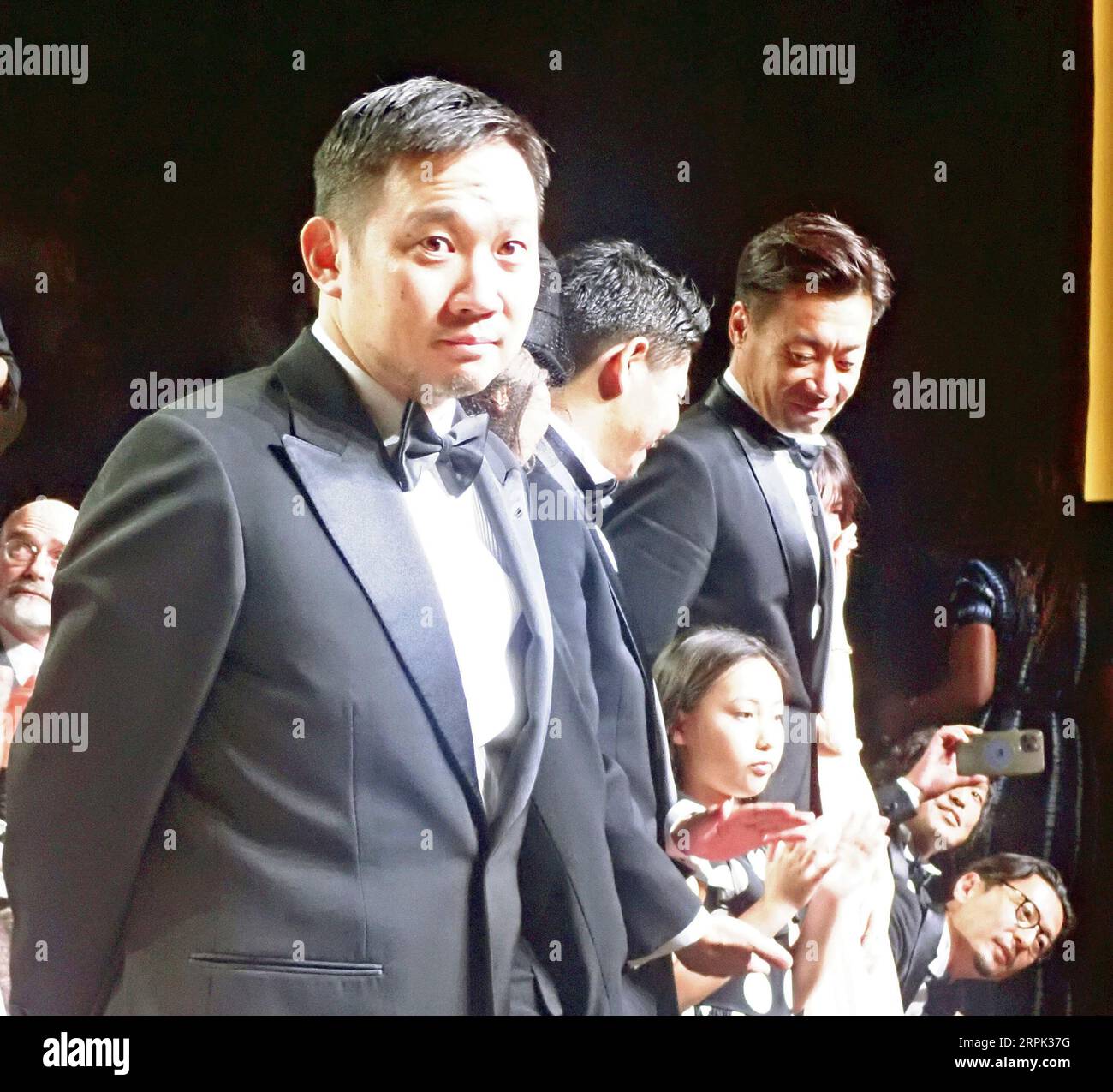 Japanese Director Ryusuke Hamaguchi And Tohers During The Premiere Of