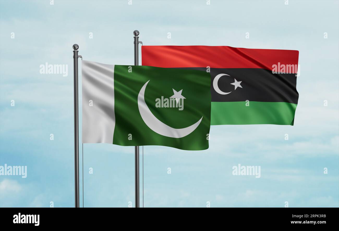 Libya and Pakistan flag waving together in the wind on blue sky, two ...