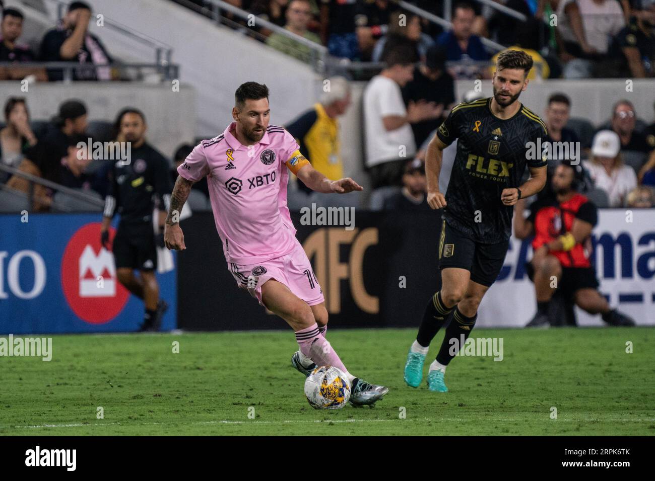 Inter Miami forward Lionel Messi (10) is defended by LAFC forward Mario ...