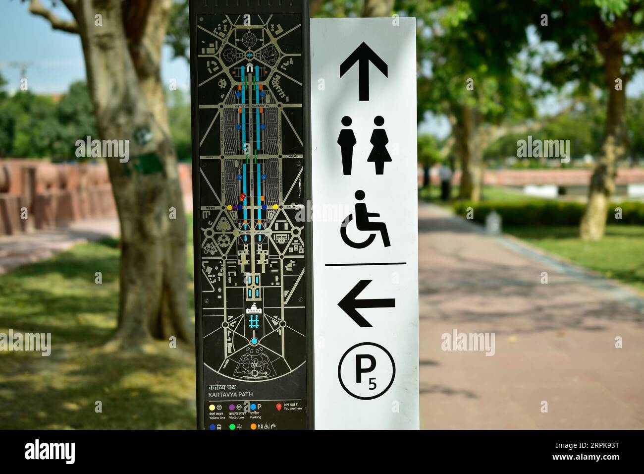 Disabled restroom sign board with map at public park Stock Photo - Alamy