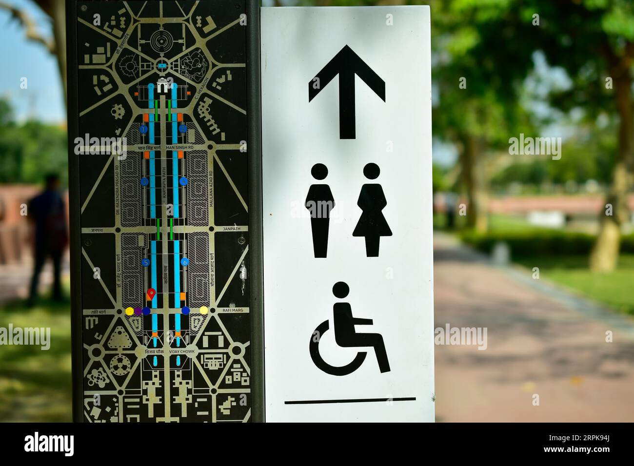 Closeup of direction sign board for disabled people with taps at public ...