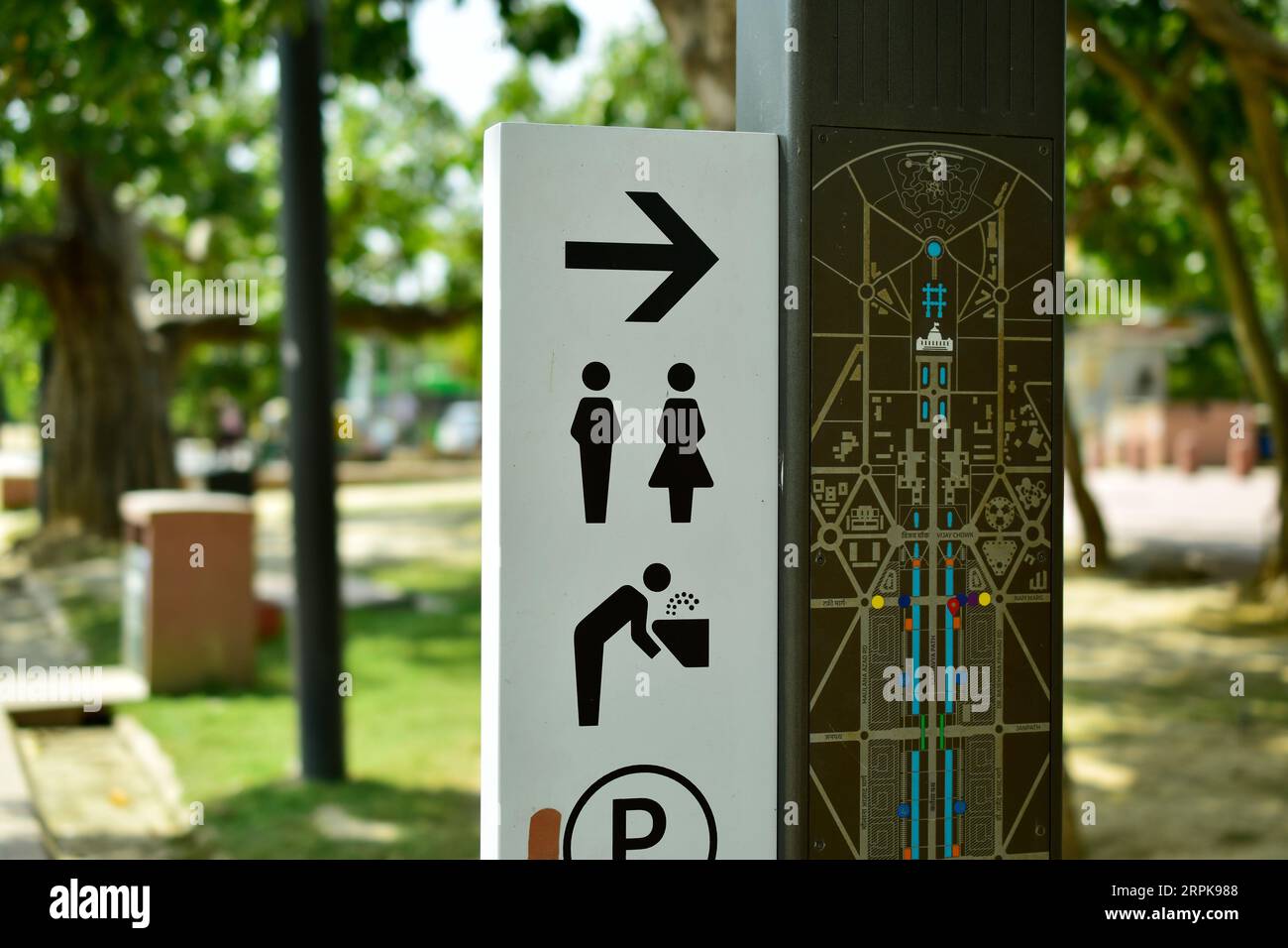 Public and disable pathway sign board with maps Stock Photo - Alamy