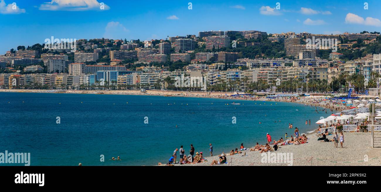 Nice, France - May 28, 2023: People on famous beaches along Promenade ...