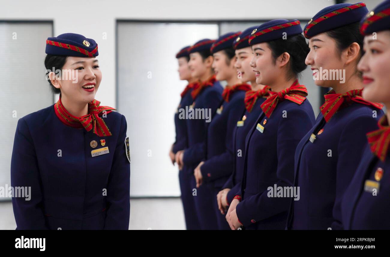 200106 -- WUHAN, Jan. 6, 2020 -- Young stewardesses take part in an ...