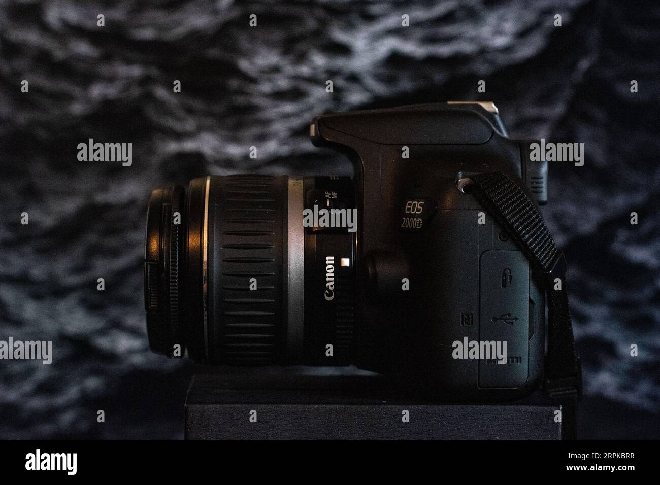 Canon EOS 2000D DSLR in black background Stock Photo - Alamy